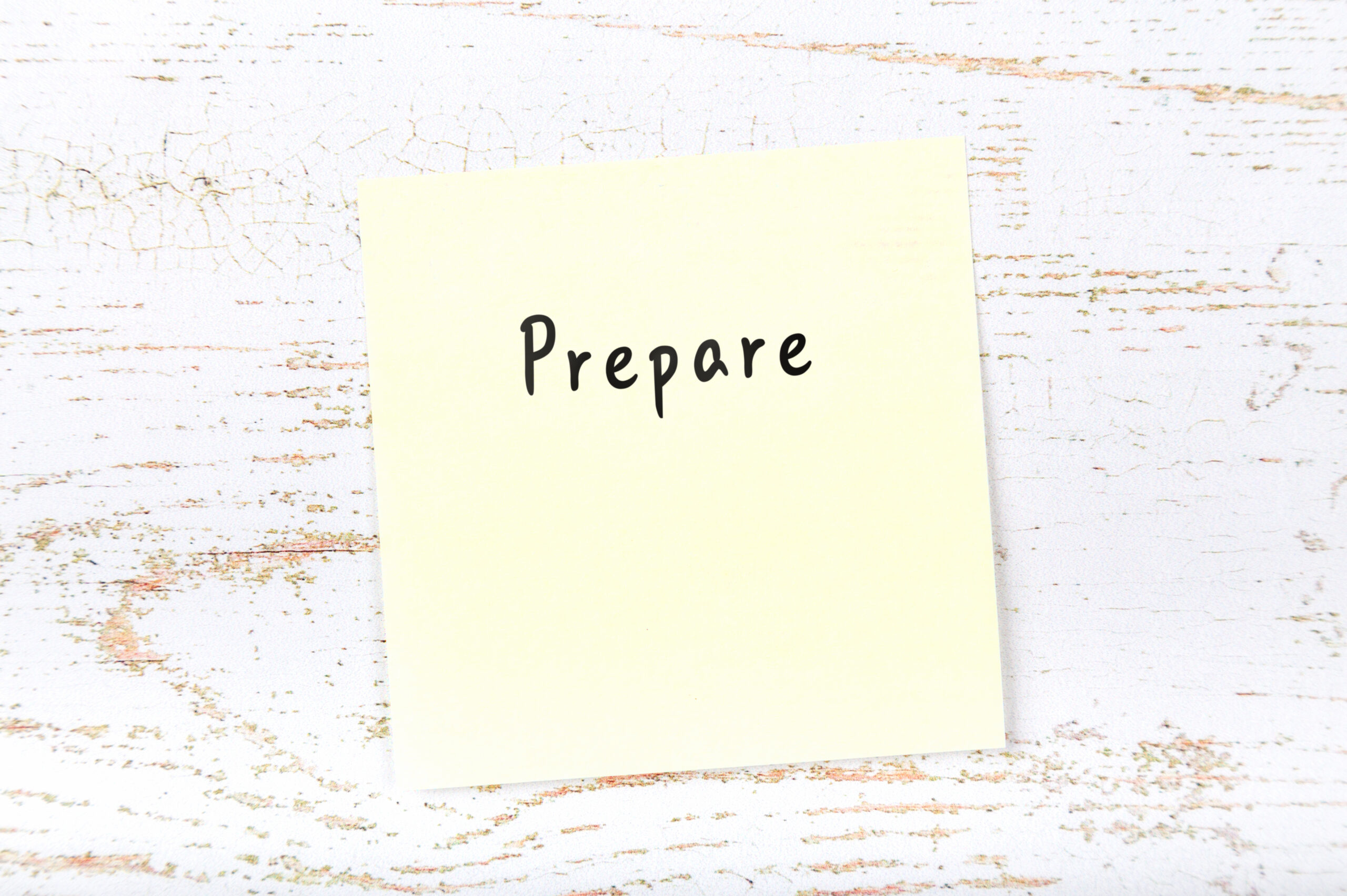 Job interview preparation. Yellow sticky note with handwritten message ...