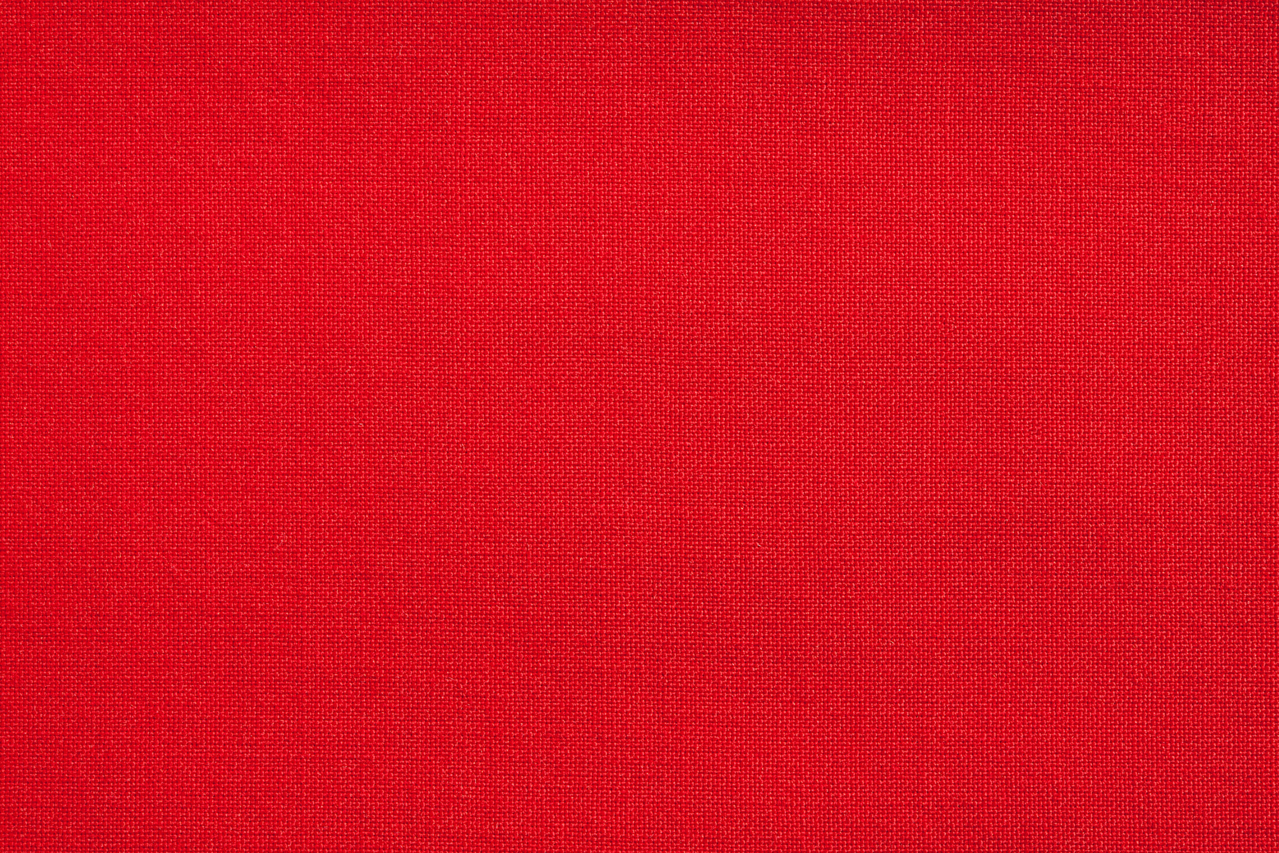 Close up of a red fabric textile texture | TRANS.Biz